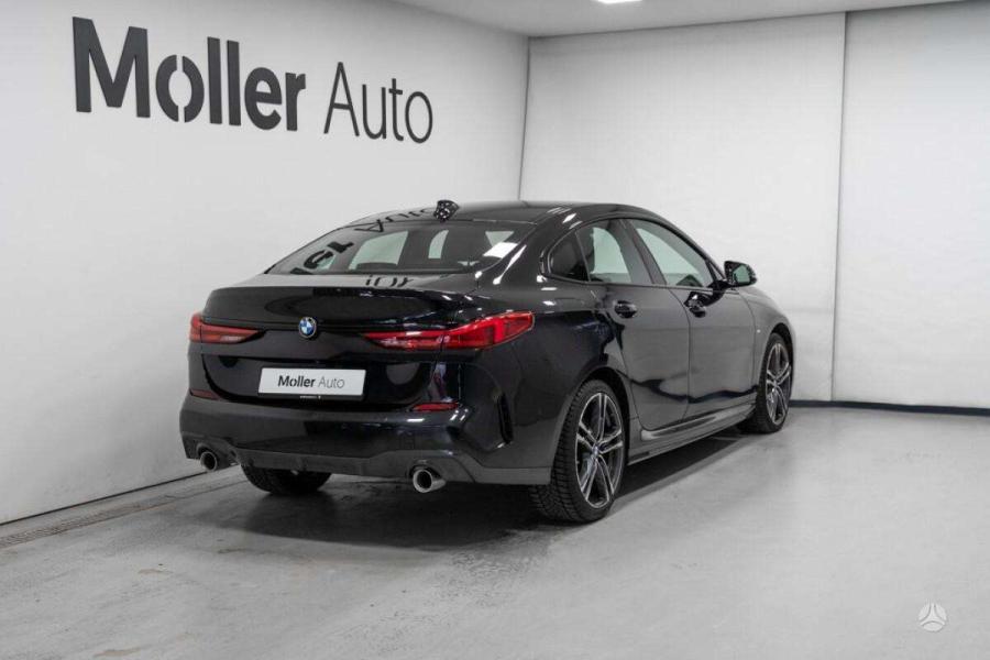 Black BMW 218 2022 in Vilnius, with an engine capacity of 2.00 L and mileage of 81 thousand km for 22900 €, photo 4 on AUTOMOTO.COM.LV