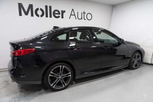 Black BMW 218 2022 in Vilnius, with an engine capacity of 2.00 L and mileage of 81 thousand km for 22900 €, photo 5 on AUTOMOTO.COM.LV