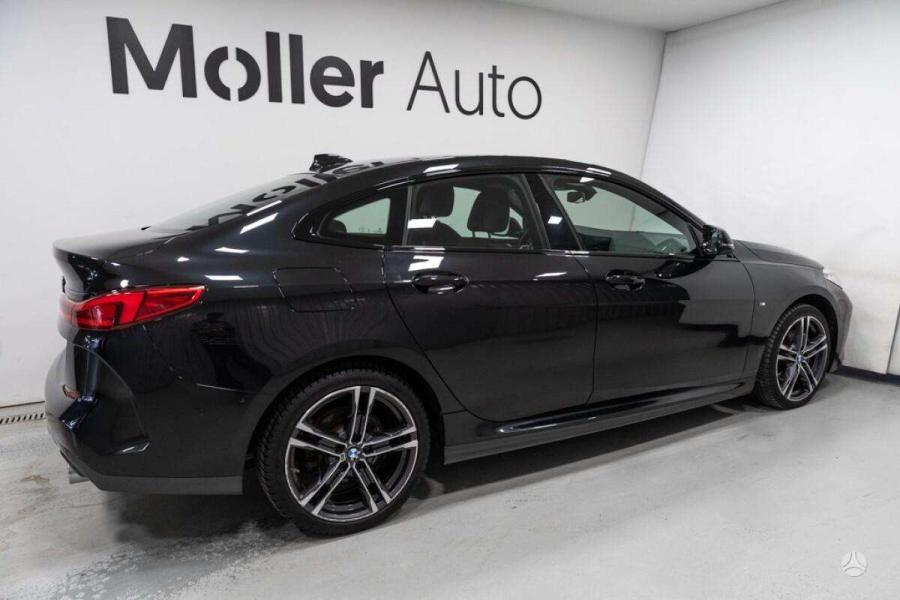Black BMW 218 2022 in Vilnius, with an engine capacity of 2.00 L and mileage of 81 thousand km for 22900 €, photo 5 on AUTOMOTO.COM.LV