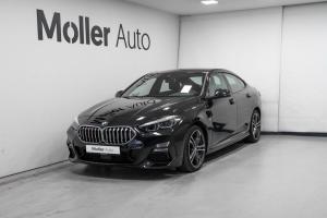Black BMW 218 2022 in Vilnius, with an engine capacity of 2.00 L and mileage of 81 thousand km for 22900 €, photo  on AUTOMOTO.COM.LV