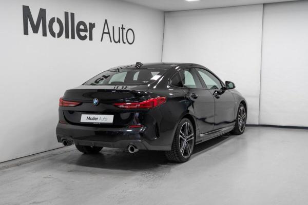 Black BMW 218 2022 in Vilnius, with an engine capacity of 2.00 L and mileage of 81 thousand km for 22900 €, photo 3 on AUTOMOTO.COM.LV