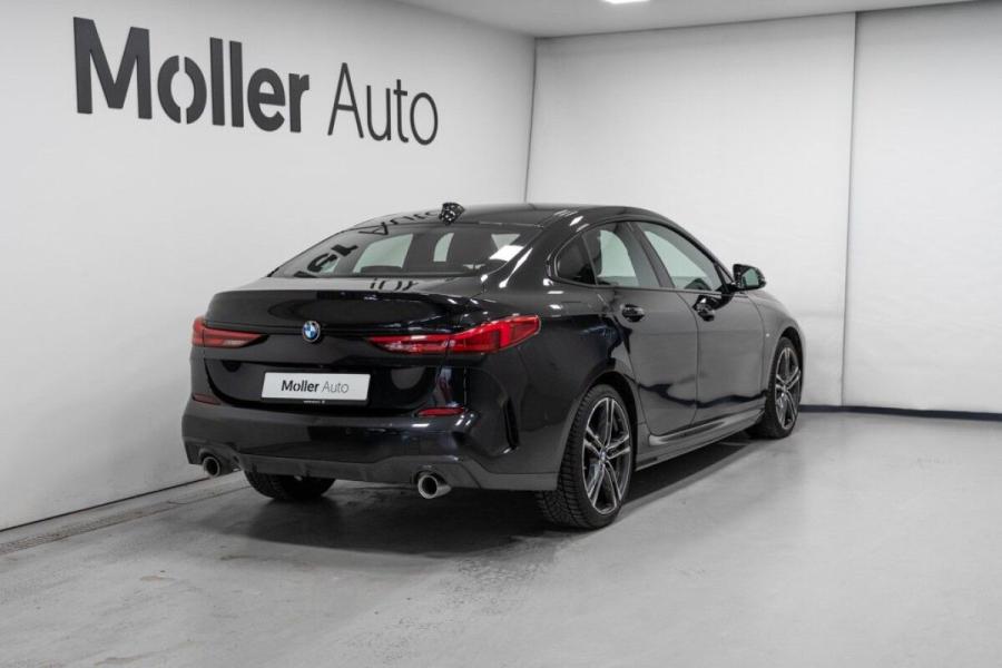 Black BMW 218 2022 in Vilnius, with an engine capacity of 2.00 L and mileage of 81 thousand km for 22900 €, photo 4 on AUTOMOTO.COM.LV