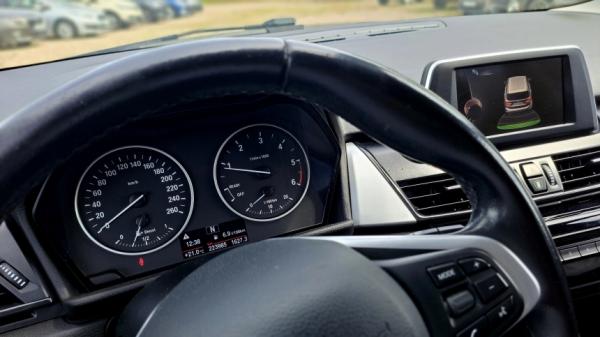 Blue BMW 218 2016 in Riga, with an engine capacity of 2.00 L and mileage of 223 thousand km for 8590 €, photo 4 on AUTOMOTO.COM.LV