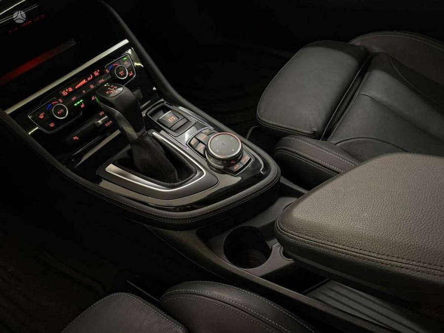 Black BMW 218 Gran Tourer 2015 in Marijampole, with an engine capacity of 2.00 L and mileage of 300 thousand km for 9450 €, photo 16 on AUTOMOTO.COM.LV