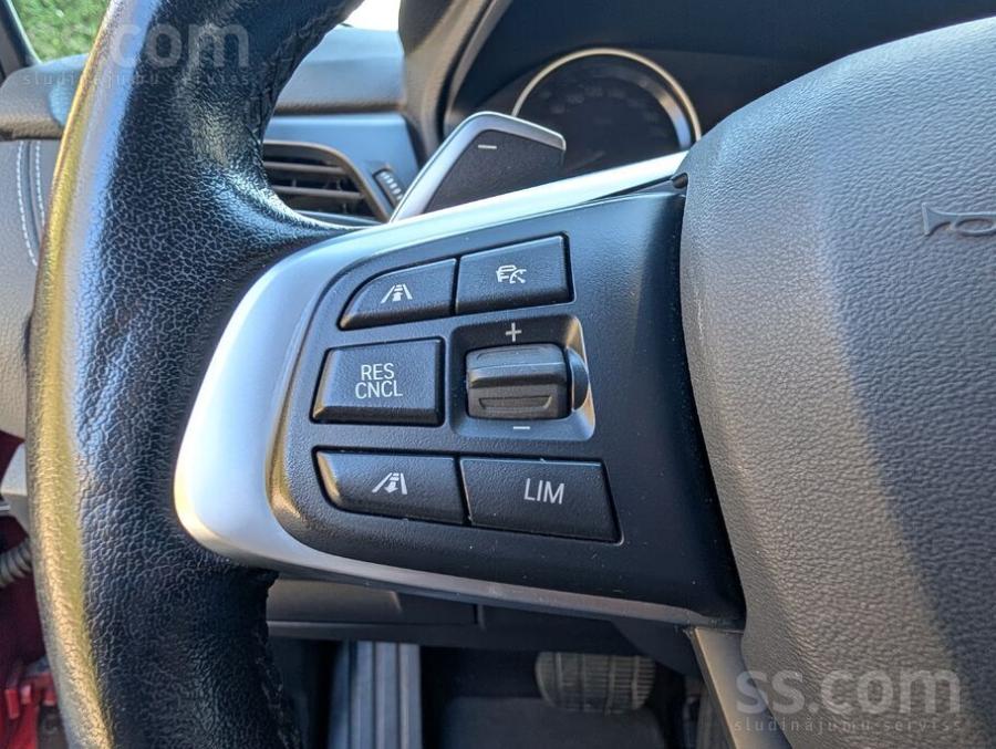 Orange BMW 218 2021 in Tukums, with an engine capacity of 2.00 L and mileage of 177 thousand km for 14700 €, photo 12 on AUTOMOTO.COM.LV