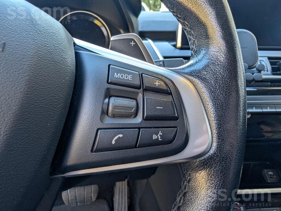 Orange BMW 218 2021 in Tukums, with an engine capacity of 2.00 L and mileage of 177 thousand km for 14700 €, photo 13 on AUTOMOTO.COM.LV