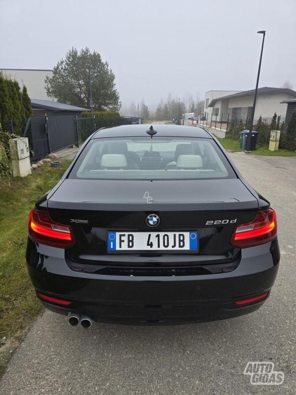Black BMW 220 2015 in Vilnius, with an engine capacity of 2.00 L and mileage of 200 thousand km for 11499 €, photo 6 on AUTOMOTO.COM.LV