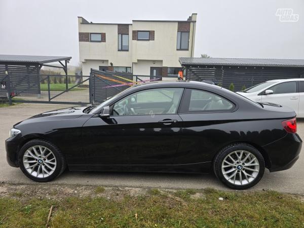 Black BMW 220 2015 in Vilnius, with an engine capacity of 2.00 L and mileage of 200 thousand km for 11499 €, photo 8 on AUTOMOTO.COM.LV