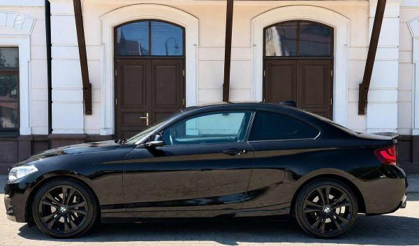 Black BMW 228 2016 in Vilnius, with an engine capacity of 2.00 L and mileage of 106 thousand km for 13500 €, photo 2 on AUTOMOTO.COM.LV