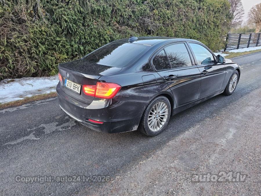 Black BMW 3 Series 2012 in Tallinn, with an engine capacity of 2.00 L and mileage of 254 thousand km for 7500 €, photo 3 on AUTOMOTO.COM.LV