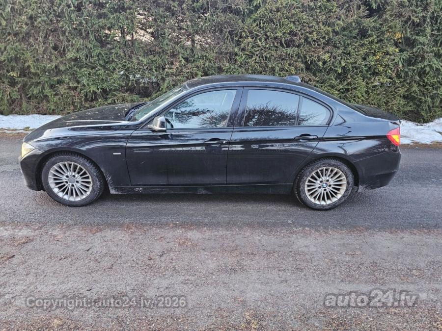Black BMW 3 Series 2012 in Tallinn, with an engine capacity of 2.00 L and mileage of 254 thousand km for 7500 €, photo 7 on AUTOMOTO.COM.LV