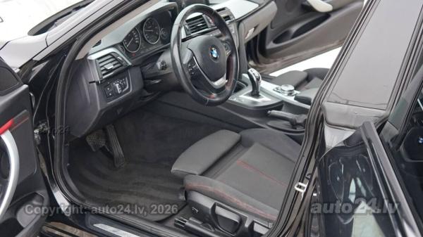 Black BMW 3 Series 2013 in Tallinn, with an engine capacity of 2.00 L and mileage of 292 thousand km for 8999 €, photo 7 on AUTOMOTO.COM.LV