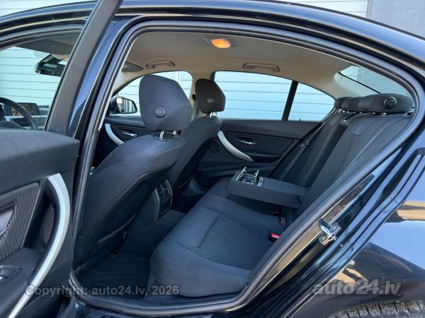 Black BMW 3 Series 2013 in Tallinn, with an engine capacity of 2.00 L and mileage of 349 thousand km for 7499 €, photo 10 on AUTOMOTO.COM.LV