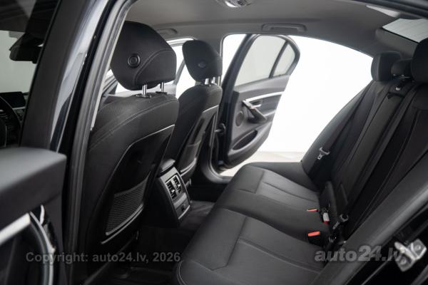 Black BMW 3 Series 2017 in Tallinn, with an engine capacity of 2.00 L and mileage of 174 thousand km for 13999 €, photo 8 on AUTOMOTO.COM.LV