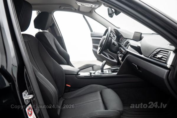 Black BMW 3 Series 2017 in Tallinn, with an engine capacity of 2.00 L and mileage of 174 thousand km for 13999 €, photo 10 on AUTOMOTO.COM.LV