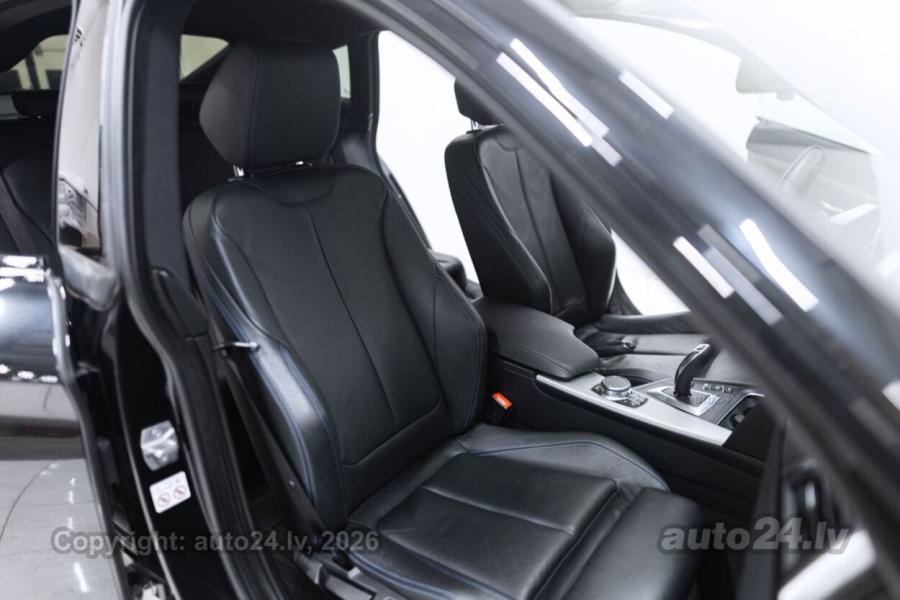 Black BMW 3 Series 2019 in Tallinn, with an engine capacity of 2.00 L and mileage of 95 thousand km for 24900 €, photo 13 on AUTOMOTO.COM.LV