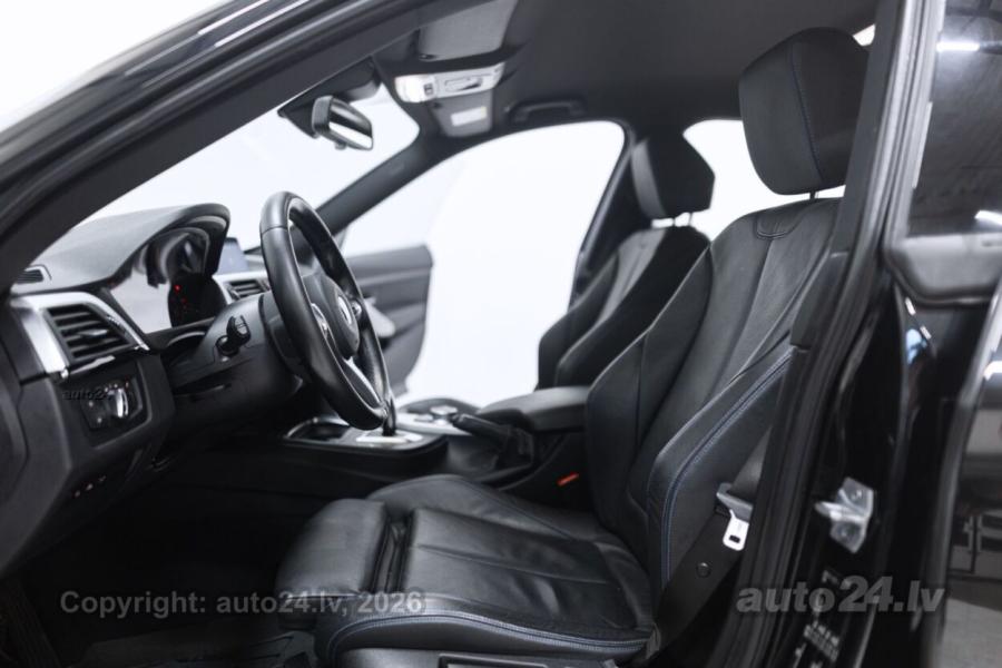 Black BMW 3 Series 2019 in Tallinn, with an engine capacity of 2.00 L and mileage of 95 thousand km for 24900 €, photo 14 on AUTOMOTO.COM.LV