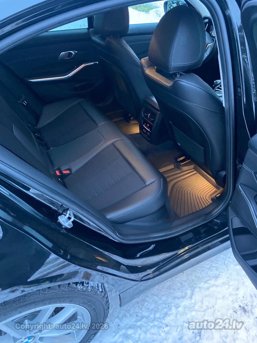 Black BMW 3 Series 2019 in Tallinn, with an engine capacity of 2.00 L and mileage of 211 thousand km for 18900 €, photo 7 on AUTOMOTO.COM.LV