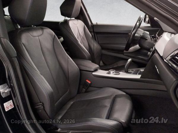 Black BMW 3 Series 2019 in Tallinn, with an engine capacity of 2.00 L and mileage of 148 thousand km for 16990 €, photo 6 on AUTOMOTO.COM.LV