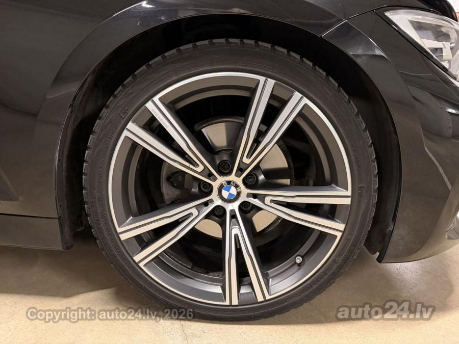 Black BMW 3 Series 2019 in Tallinn, with an engine capacity of 2.00 L and mileage of 90 thousand km for 26490 €, photo 17 on AUTOMOTO.COM.LV
