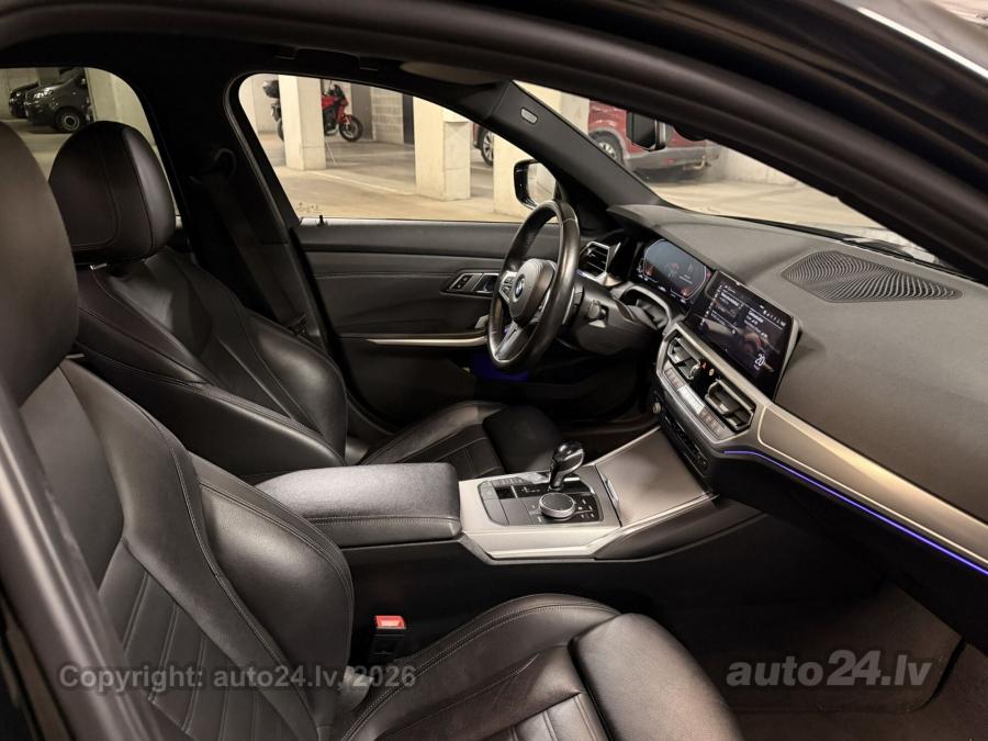 Black BMW 3 Series 2019 in Tallinn, with an engine capacity of 2.00 L and mileage of 90 thousand km for 26490 €, photo 20 on AUTOMOTO.COM.LV