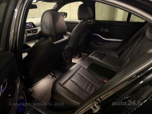 Black BMW 3 Series 2019 in Tallinn, with an engine capacity of 2.00 L and mileage of 90 thousand km for 26490 €, photo 22 on AUTOMOTO.COM.LV