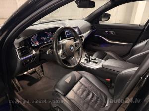 Black BMW 3 Series 2019 in Tallinn, with an engine capacity of 2.00 L and mileage of 90 thousand km for 26490 €, photo 23 on AUTOMOTO.COM.LV