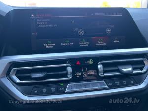 Black BMW 3 Series 2021 in Tallinn, with an engine capacity of 2.00 L and mileage of 143 thousand km for 30900 €, photo 16 on AUTOMOTO.COM.LV