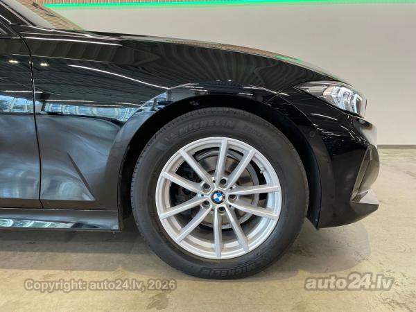 Black BMW 3 Series 2023 in Tallinn, with an engine capacity of 2.00 L and mileage of 65 thousand km for 29990 €, photo 5 on AUTOMOTO.COM.LV