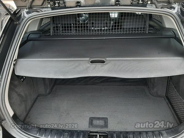 Black BMW 3 Series 2009 in Tartu, with an engine capacity of 3.00 L and mileage of 265 thousand km for 6990 €, photo 10 on AUTOMOTO.COM.LV