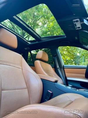 Black BMW 3 Series 2010 in Tallinn, with an engine capacity of 3.00 L and mileage of 299 thousand km for 10900 €, photo 35 on AUTOMOTO.COM.LV