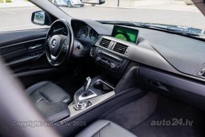 Black BMW 3 Series 2013 in Tallinn, with an engine capacity of 2.00 L and mileage of 214 thousand km for 10500 €, photo 14 on AUTOMOTO.COM.LV