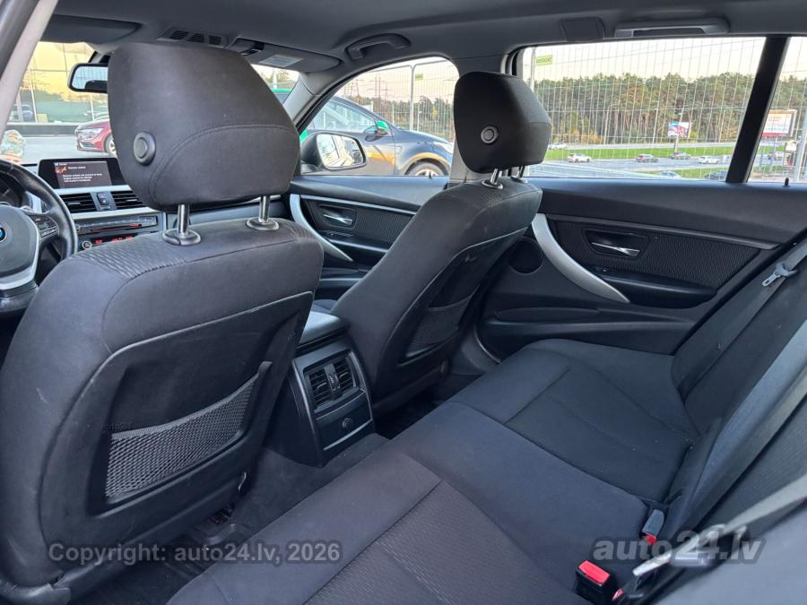 Black BMW 3 Series 2013 in Tallinn, with an engine capacity of 2.00 L and mileage of 266 thousand km for 8900 €, photo 14 on AUTOMOTO.COM.LV