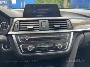 Melns BMW 3 Series 2014 Paide, ar dzinēja tilpumu 2.00 L un nobraukumu 295 tūkst. km par 6990 €, foto 18 vietnē AUTOMOTO.COM.LV