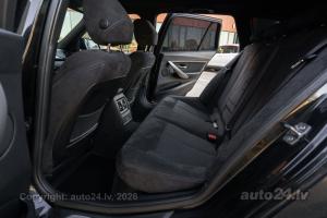 Black BMW 3 Series 2016 in Tartu, with an engine capacity of 2.00 L and mileage of 270 thousand km for 12490 €, photo 11 on AUTOMOTO.COM.LV