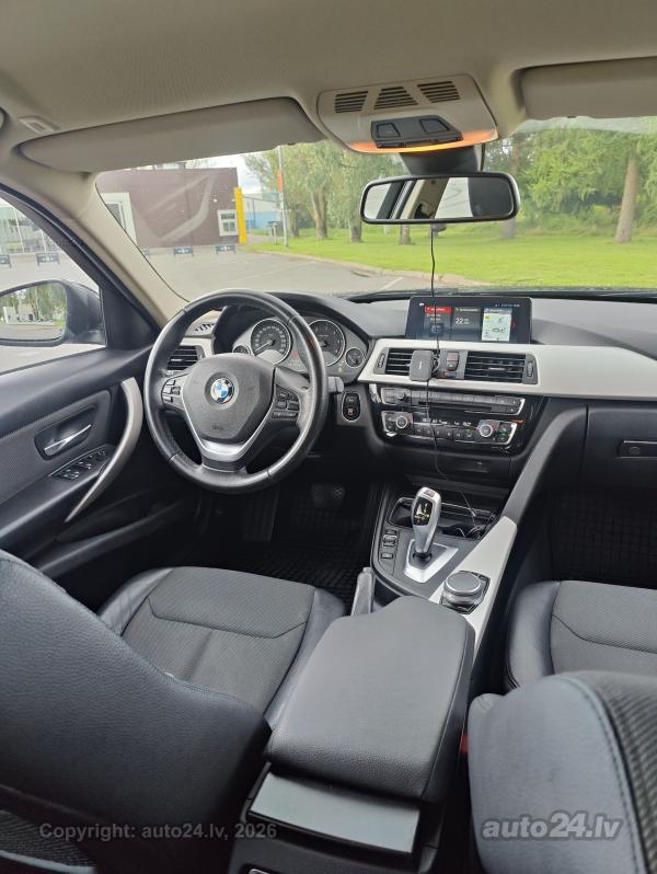 Black BMW 3 Series 2018 in Tallinn, with an engine capacity of 2.00 L and mileage of 196 thousand km for 13300 €, photo 6 on AUTOMOTO.COM.LV