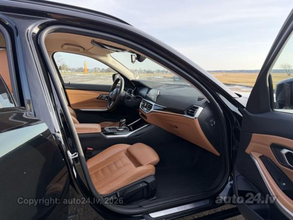 Black BMW 3 Series 2019 in Tallinn, with an engine capacity of 2.00 L and mileage of 168 thousand km for 23500 €, photo 8 on AUTOMOTO.COM.LV