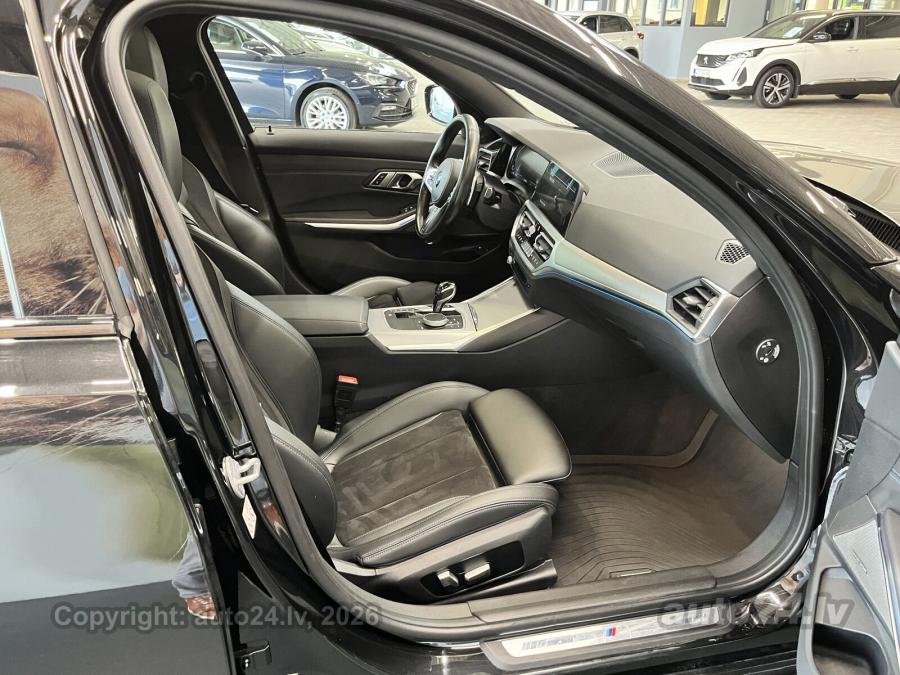Black BMW 3 Series 2021 in Tallinn, with an engine capacity of 2.00 L and mileage of 102 thousand km for 24200 €, photo 6 on AUTOMOTO.COM.LV