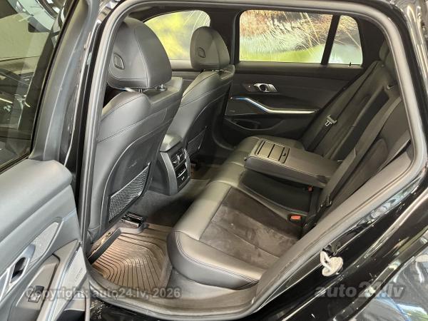 Black BMW 3 Series 2021 in Tallinn, with an engine capacity of 2.00 L and mileage of 102 thousand km for 24200 €, photo 6 on AUTOMOTO.COM.LV
