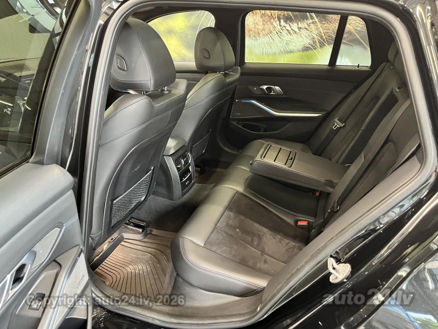 Black BMW 3 Series 2021 in Tallinn, with an engine capacity of 2.00 L and mileage of 102 thousand km for 24200 €, photo 7 on AUTOMOTO.COM.LV