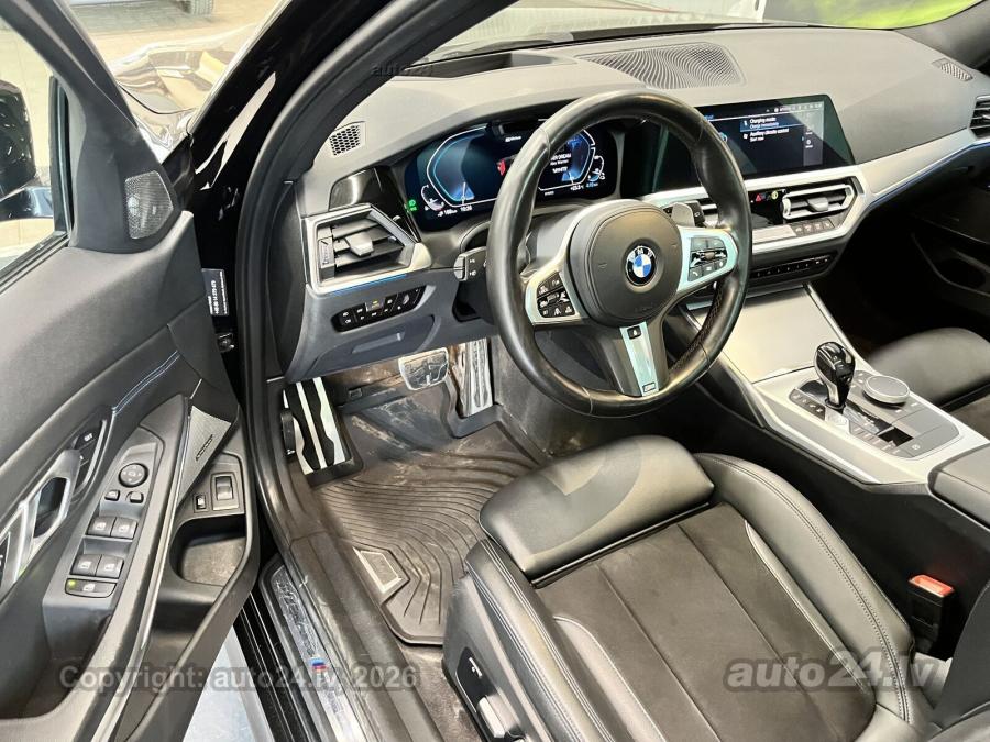 Black BMW 3 Series 2021 in Tallinn, with an engine capacity of 2.00 L and mileage of 102 thousand km for 24200 €, photo 9 on AUTOMOTO.COM.LV