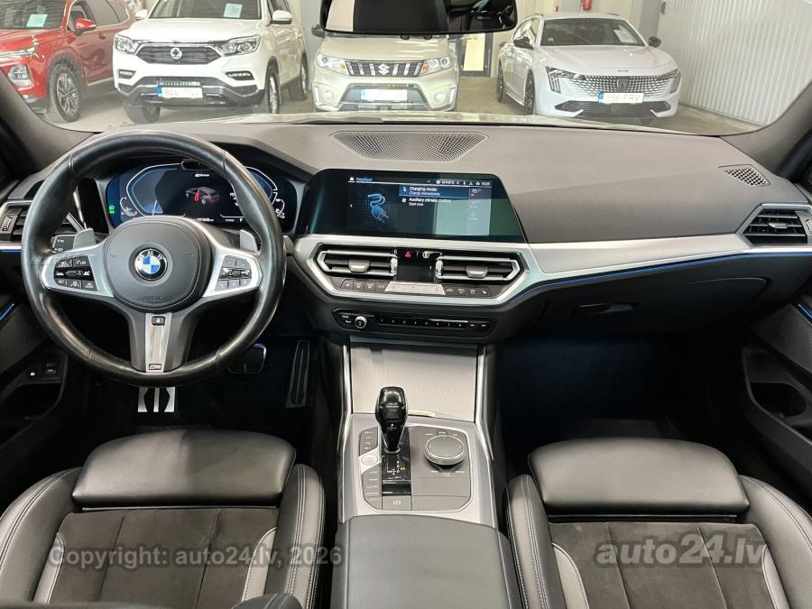 Black BMW 3 Series 2021 in Tallinn, with an engine capacity of 2.00 L and mileage of 102 thousand km for 24200 €, photo 12 on AUTOMOTO.COM.LV