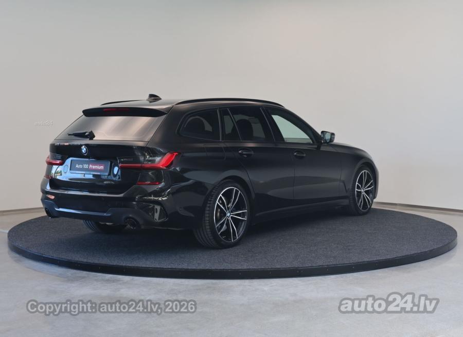 Black BMW 3 Series 2021 in Tallinn, with an engine capacity of 2.00 L and mileage of 155 thousand km for 28900 €, photo 4 on AUTOMOTO.COM.LV