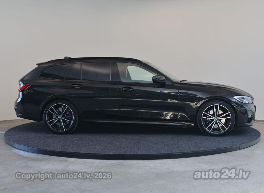 Black BMW 3 Series 2021 in Tallinn, with an engine capacity of 2.00 L and mileage of 155 thousand km for 28900 €, photo 7 on AUTOMOTO.COM.LV