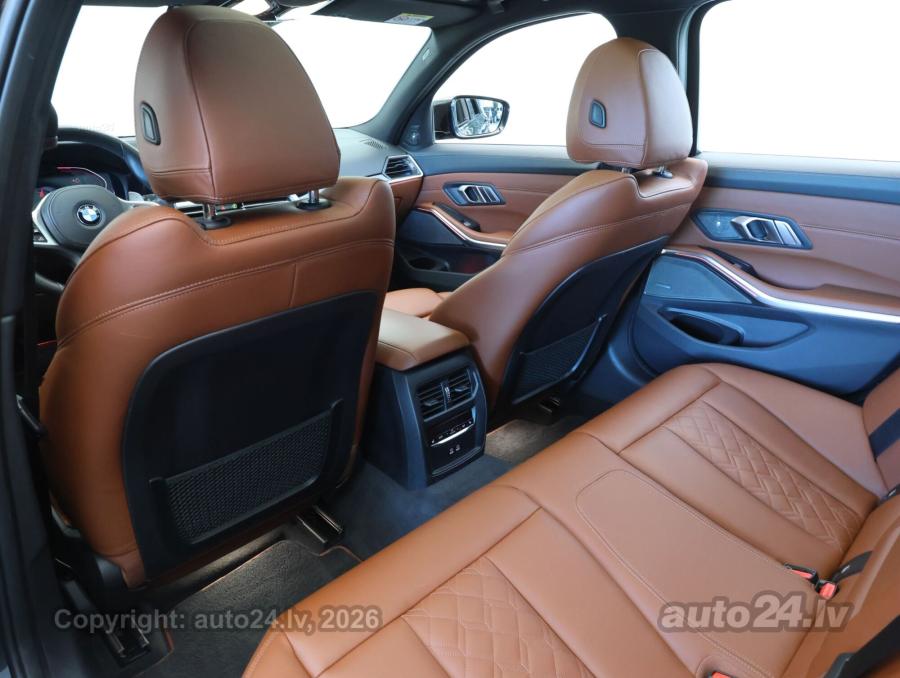 Black BMW 3 Series 2021 in Tallinn, with an engine capacity of 2.00 L and mileage of 155 thousand km for 28900 €, photo 15 on AUTOMOTO.COM.LV
