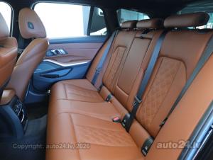 Black BMW 3 Series 2021 in Tallinn, with an engine capacity of 2.00 L and mileage of 155 thousand km for 28900 €, photo 16 on AUTOMOTO.COM.LV