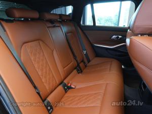 Black BMW 3 Series 2021 in Tallinn, with an engine capacity of 2.00 L and mileage of 155 thousand km for 28900 €, photo 18 on AUTOMOTO.COM.LV