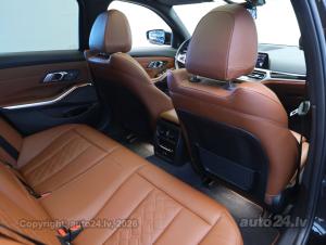 Black BMW 3 Series 2021 in Tallinn, with an engine capacity of 2.00 L and mileage of 155 thousand km for 28900 €, photo 19 on AUTOMOTO.COM.LV