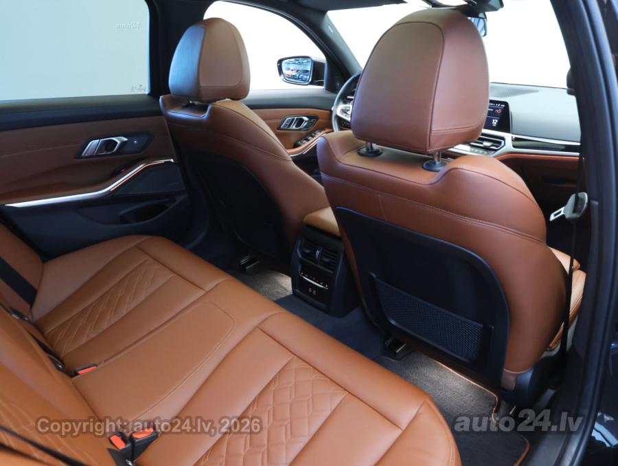 Black BMW 3 Series 2021 in Tallinn, with an engine capacity of 2.00 L and mileage of 155 thousand km for 28900 €, photo 19 on AUTOMOTO.COM.LV