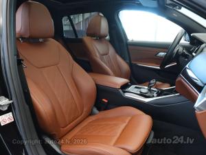 Black BMW 3 Series 2021 in Tallinn, with an engine capacity of 2.00 L and mileage of 155 thousand km for 28900 €, photo 20 on AUTOMOTO.COM.LV